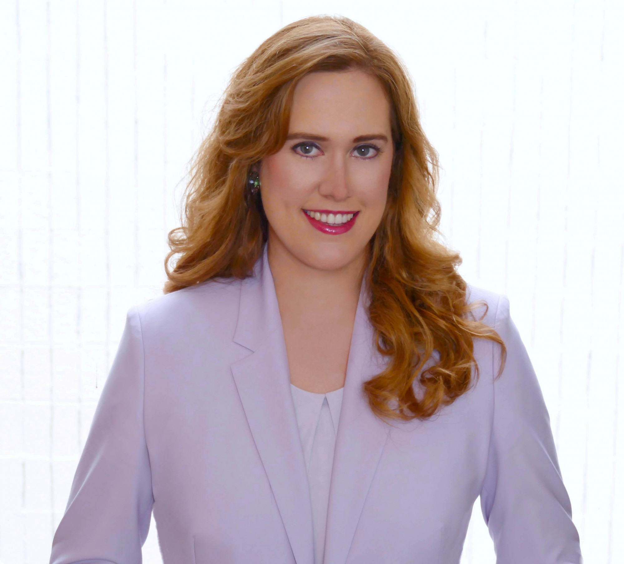 Katherine Chloé Cahoon - Anchor, Host and Enterprise Reporter.